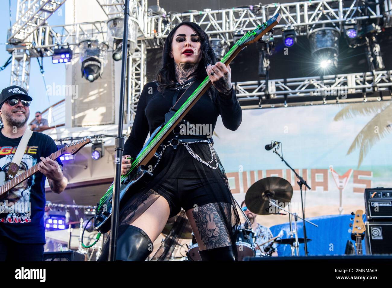 Alecia 'Mixi' Demner performs with The Stowaways on board the Carnival ...