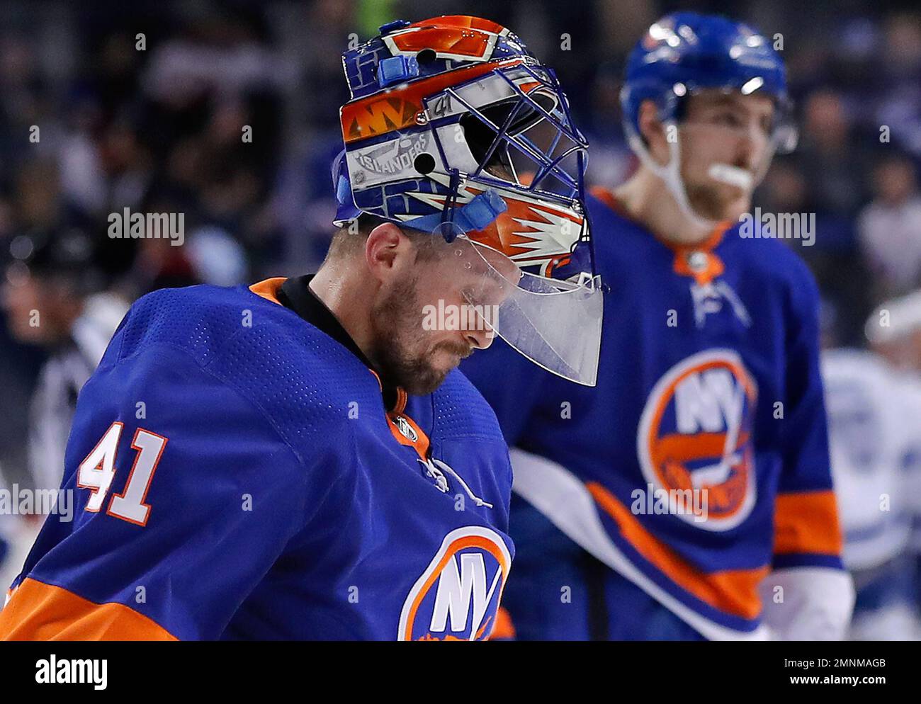 New York Islanders goaltender Jaroslav Halak (41) skates off the ice ...