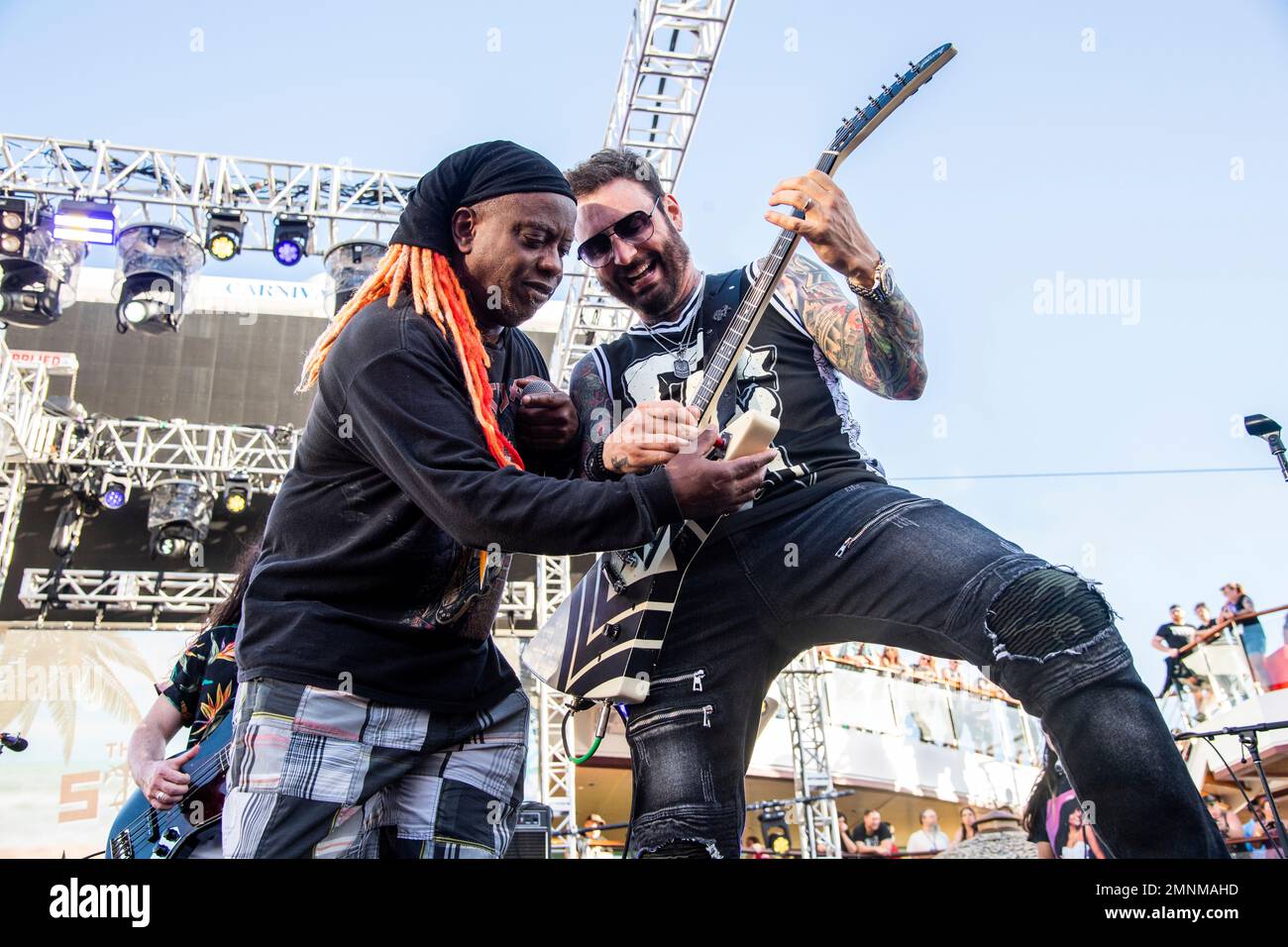 Corey Glover, left, and Jason Hook perform with The Stowaways on board ...
