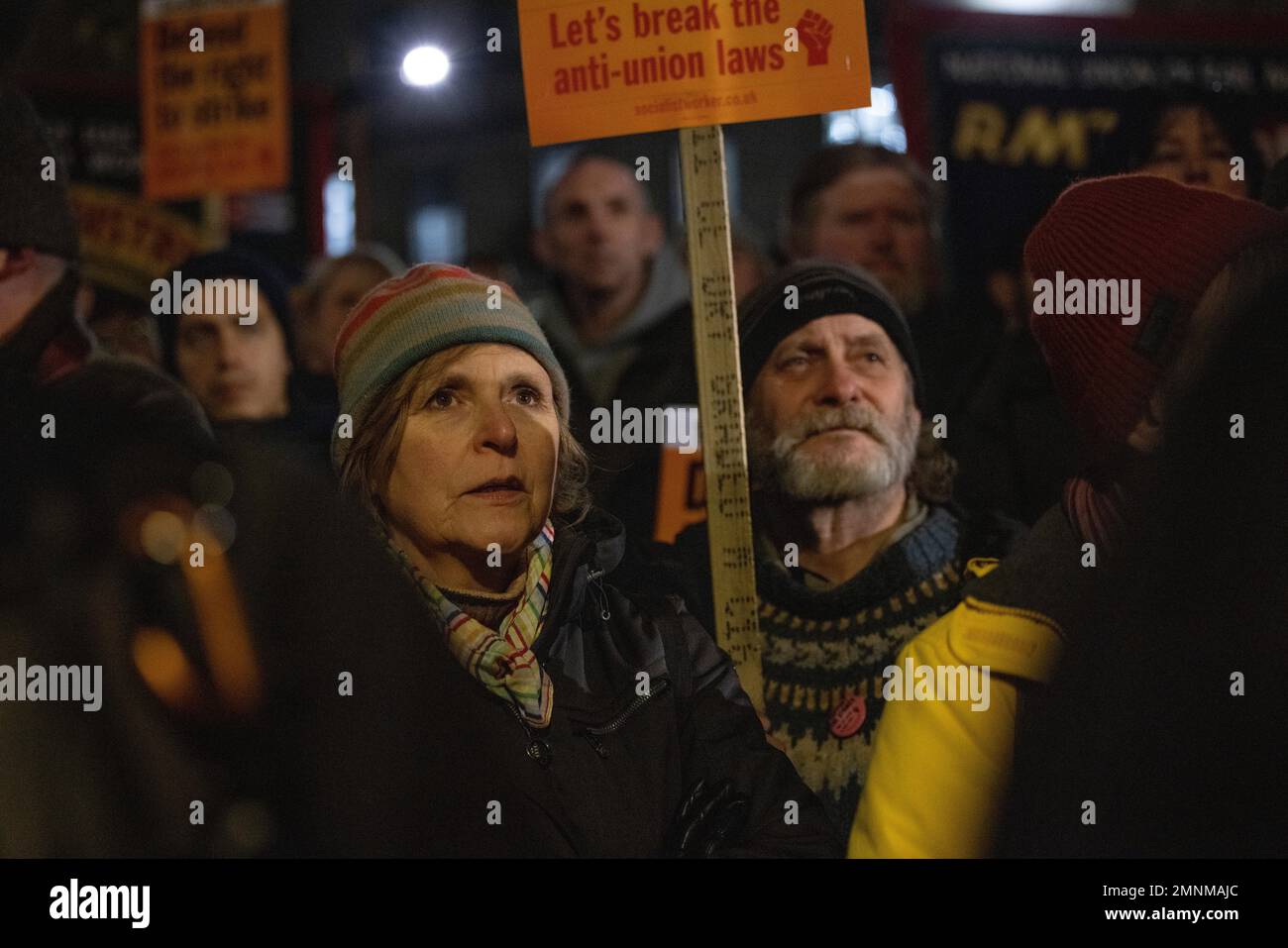 Protesters are seen listening to the speeches during the Enough is ...