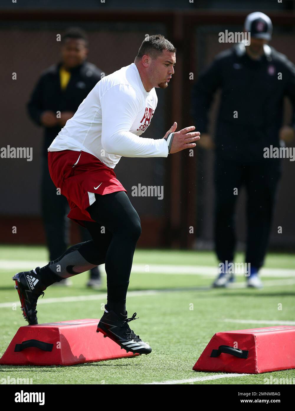 Stanford's defensive lineman Harrison Philips runs a drill during an ...