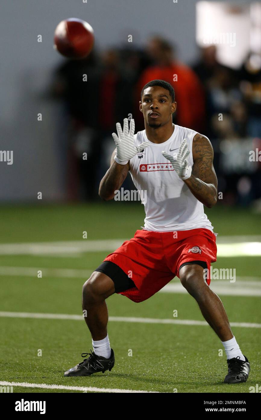 Receiver Trevon Saunders runs a drill during Ohio State's Pro Day ...