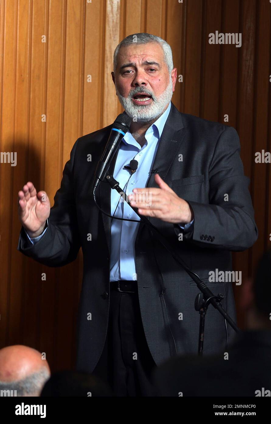 Palestinian Hamas leader Ismail Haniyeh, speaks to the mourners in ...