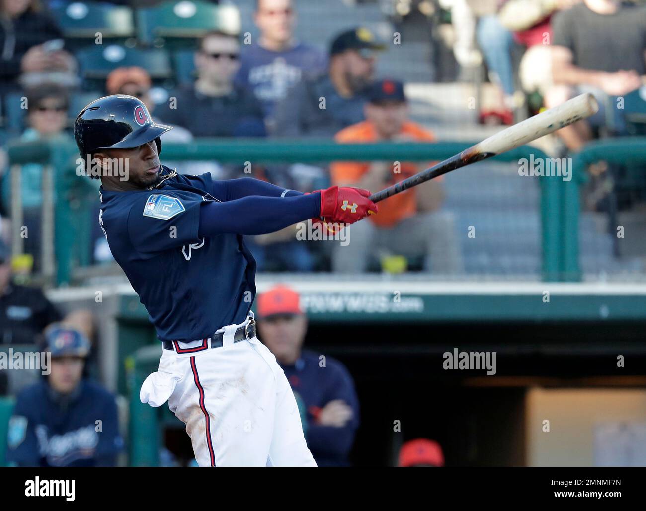 Atlanta Braves' Ozzie Albies hits a single in the first inning of a ...