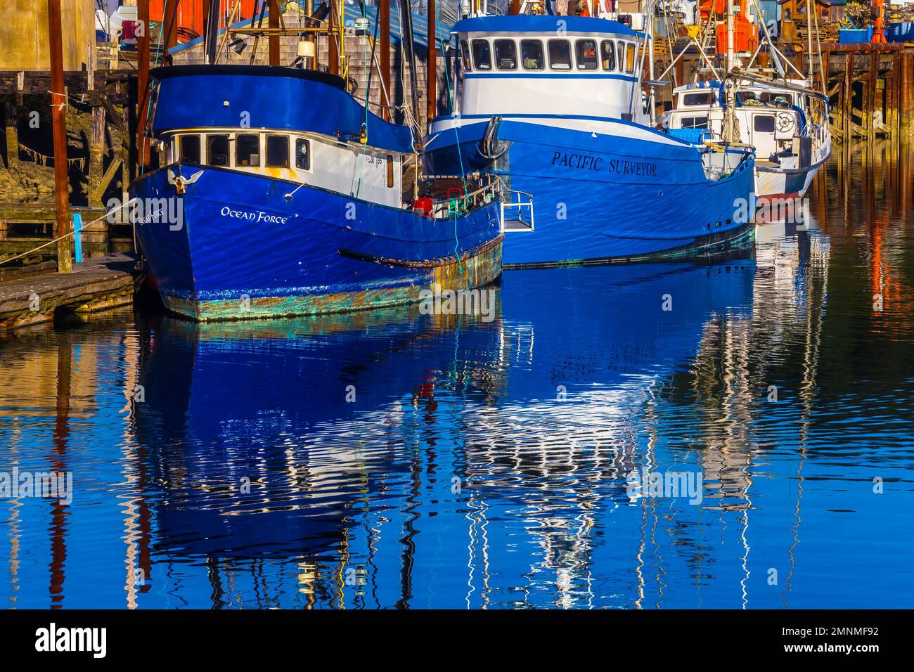 Blue Boats Reflection Stock Photo - Alamy