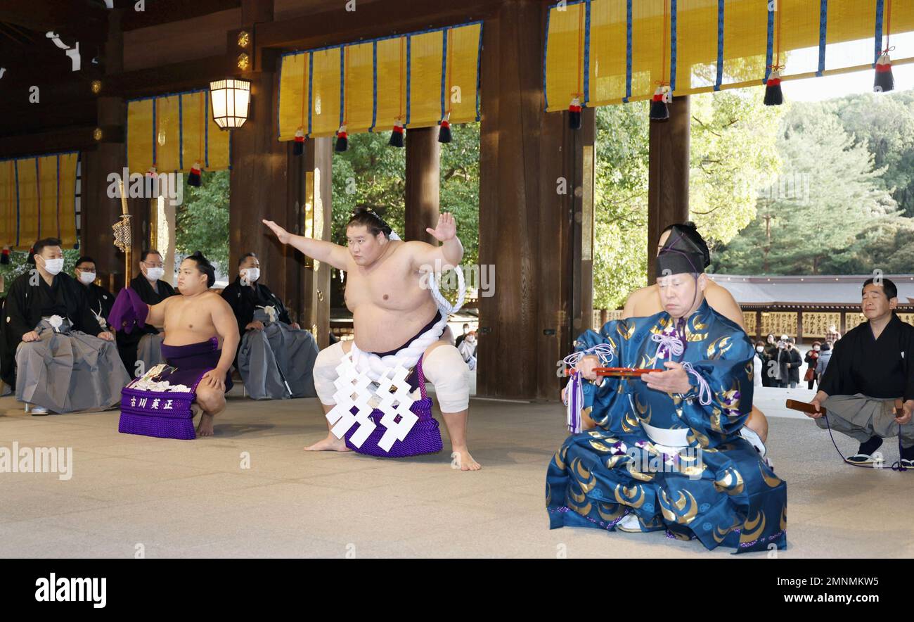 Sumo grand champion Terunofuji performs a ring-entering ritual at Meiji ...