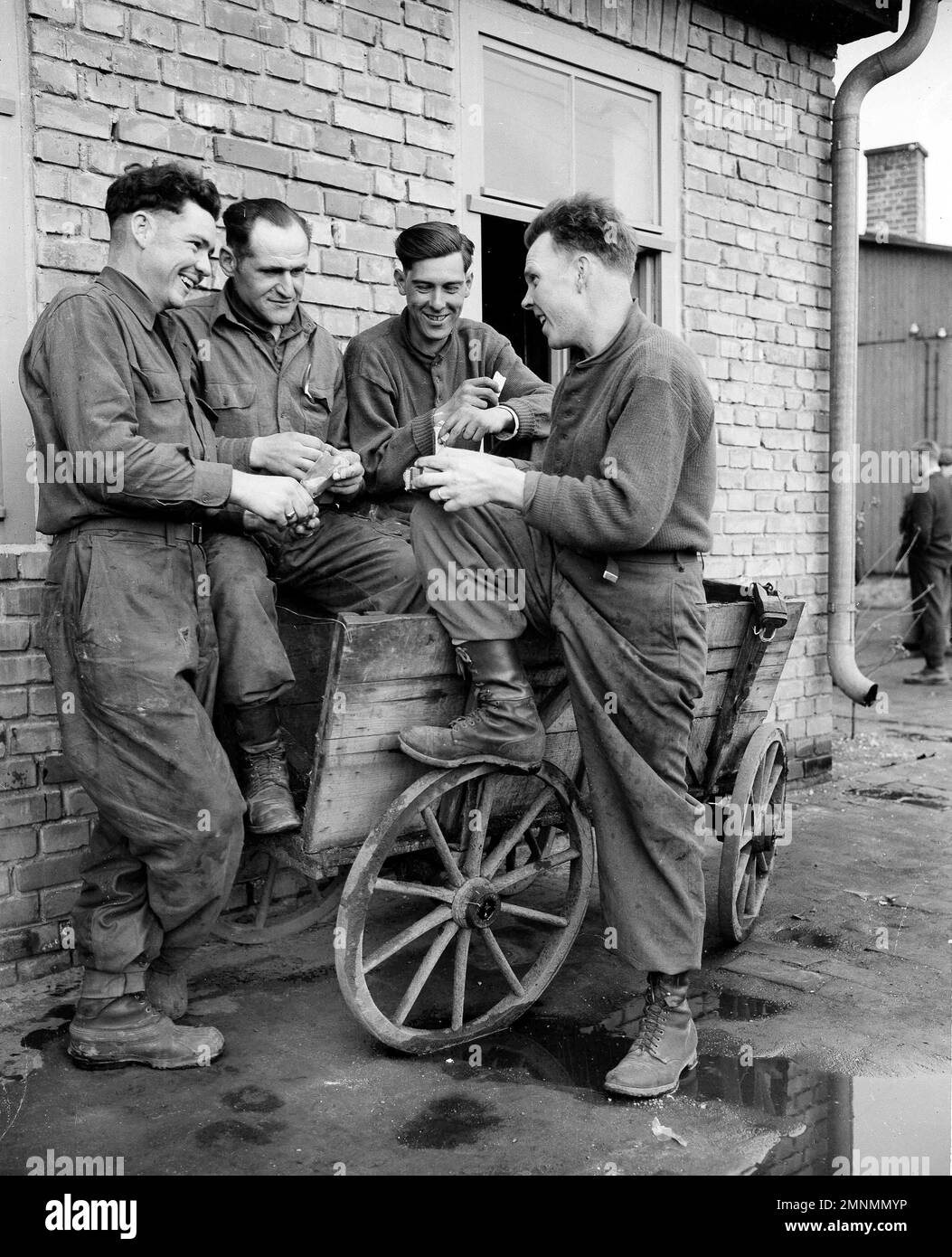 Four American soldiers who were liberated from the Grunau prison camp ...