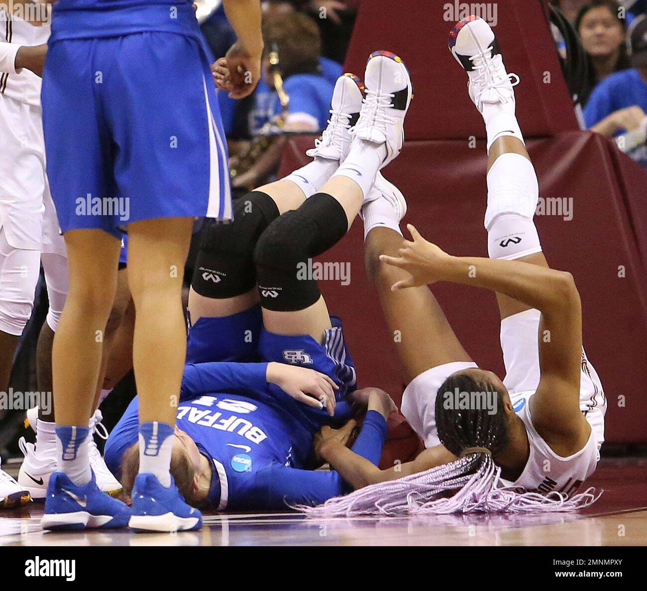 Buffalo's Mariah Suchan and Florida State's Ama Degbeon fight for a ...