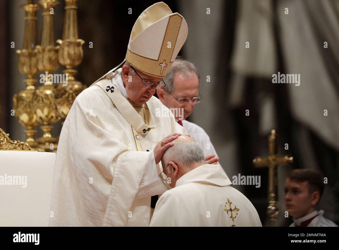 Pope Francis ordains bishop Alfred Xuereb, as he celebrates a mass ...