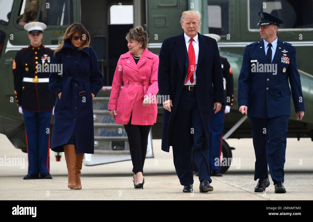 President Donald Trump and first lady Melania Trump walk from Marine ...