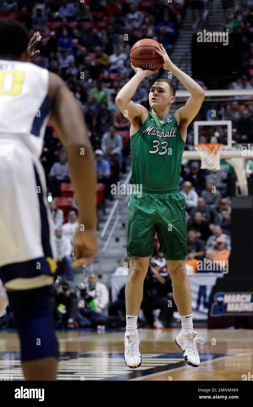 Marshall guard Jon Elmore (33) shoots against West Virginia during the ...