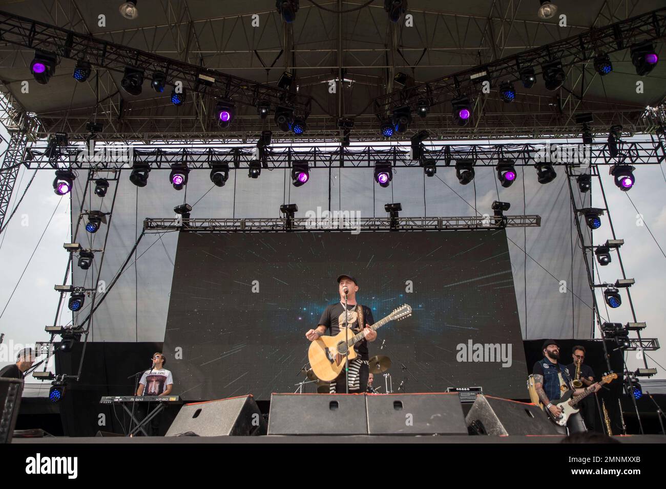 Rolando "Rolo" Sartorio, center, lead singer of the Argentine rock band ...