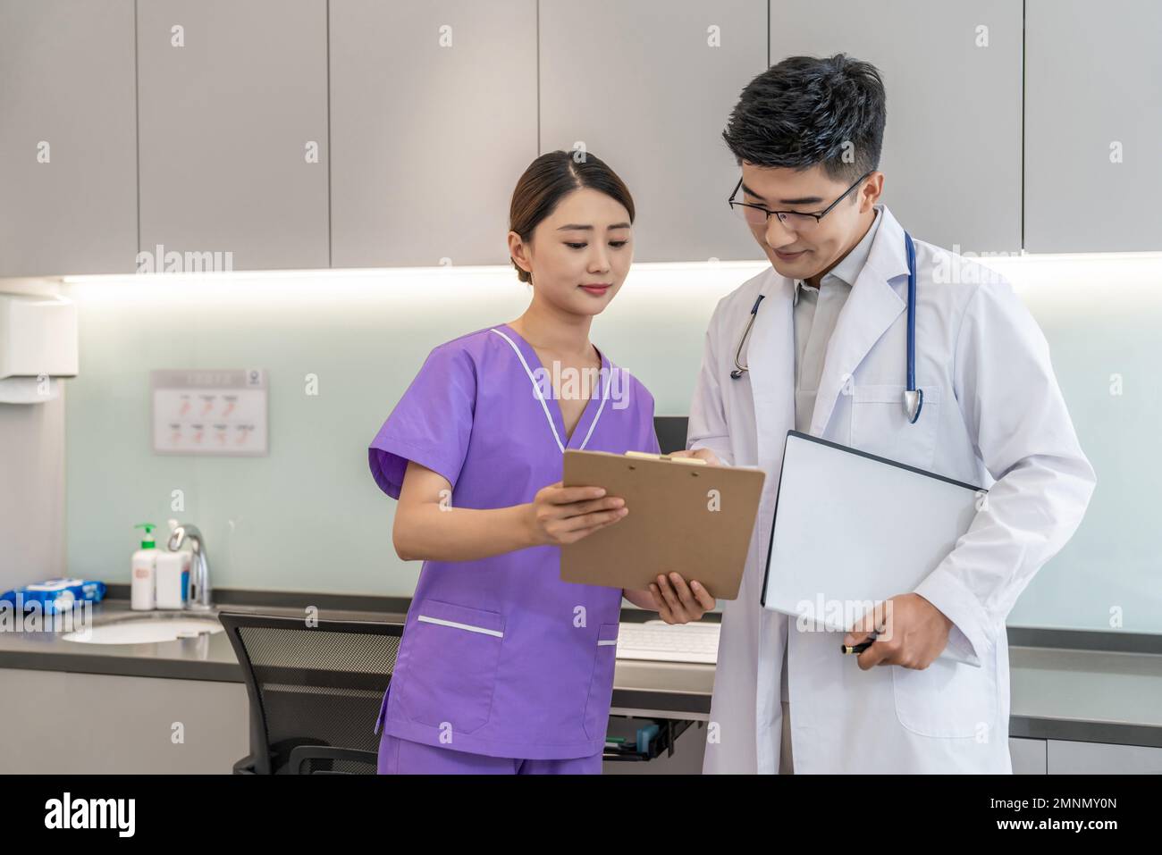 Two doctors at the clinic work Stock Photo - Alamy