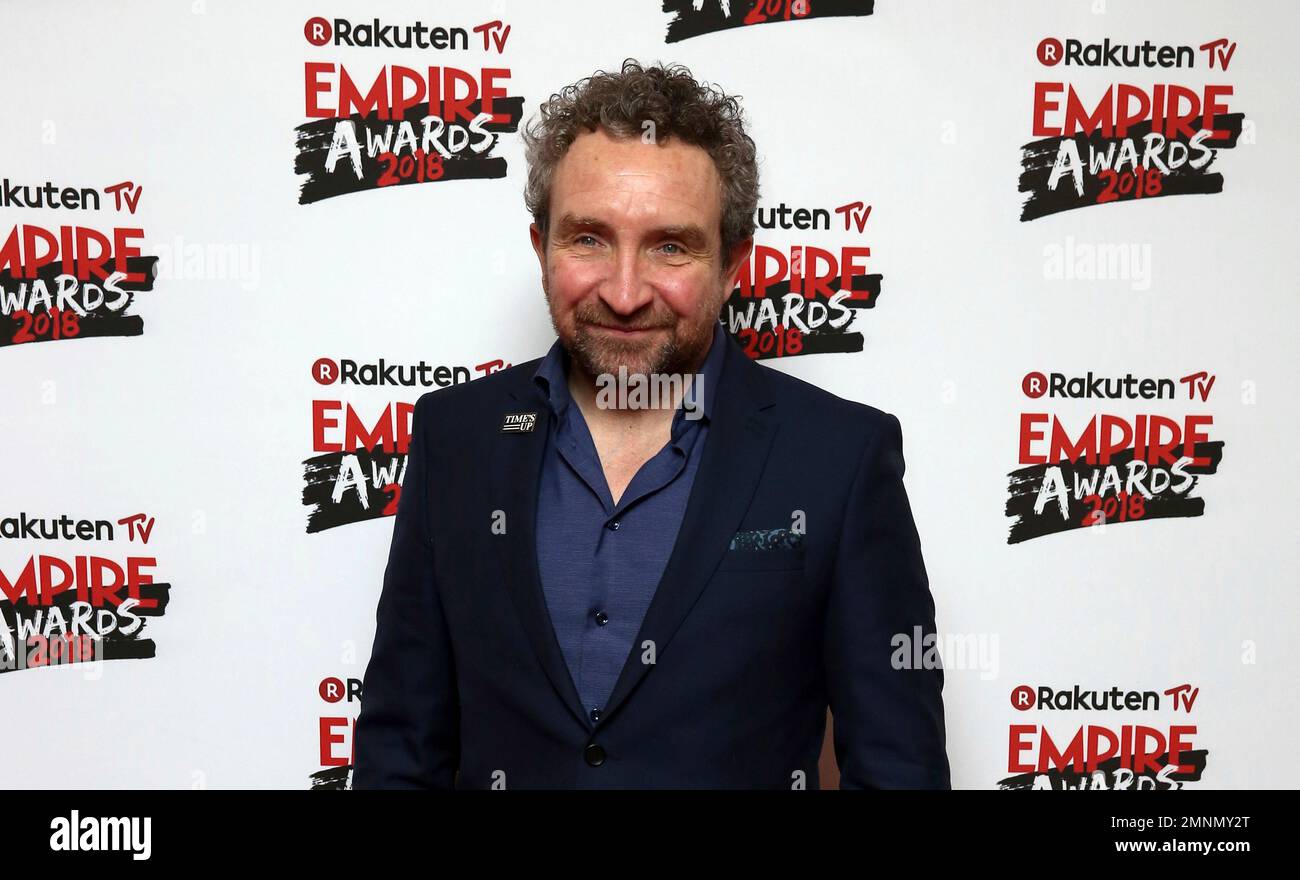 Actor Eddie Marsan poses for photographers on arrival at the Empire ...
