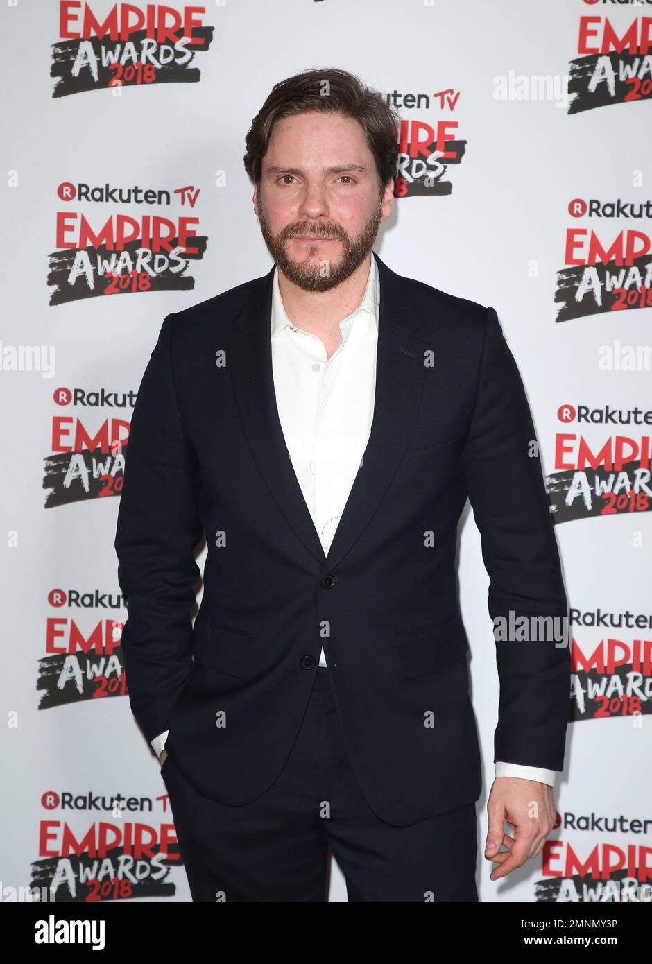 Actor Daniel Bruhl poses for photographers at the Empire Film Awards in ...