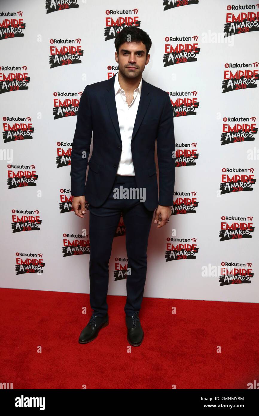 Actor Sean Teale poses for photographers on arrival at the Empire Film ...
