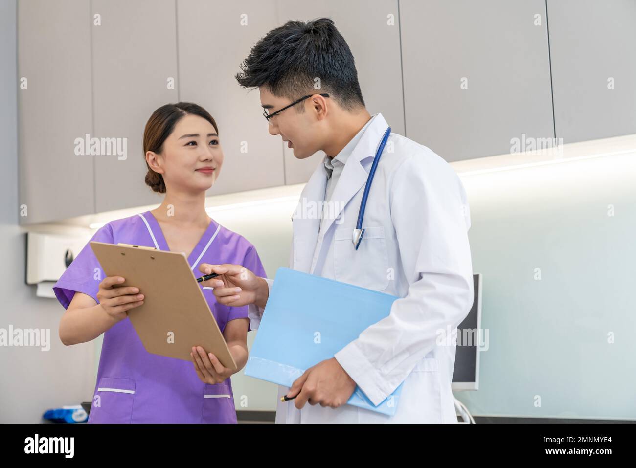 Two doctors at the clinic work Stock Photo - Alamy