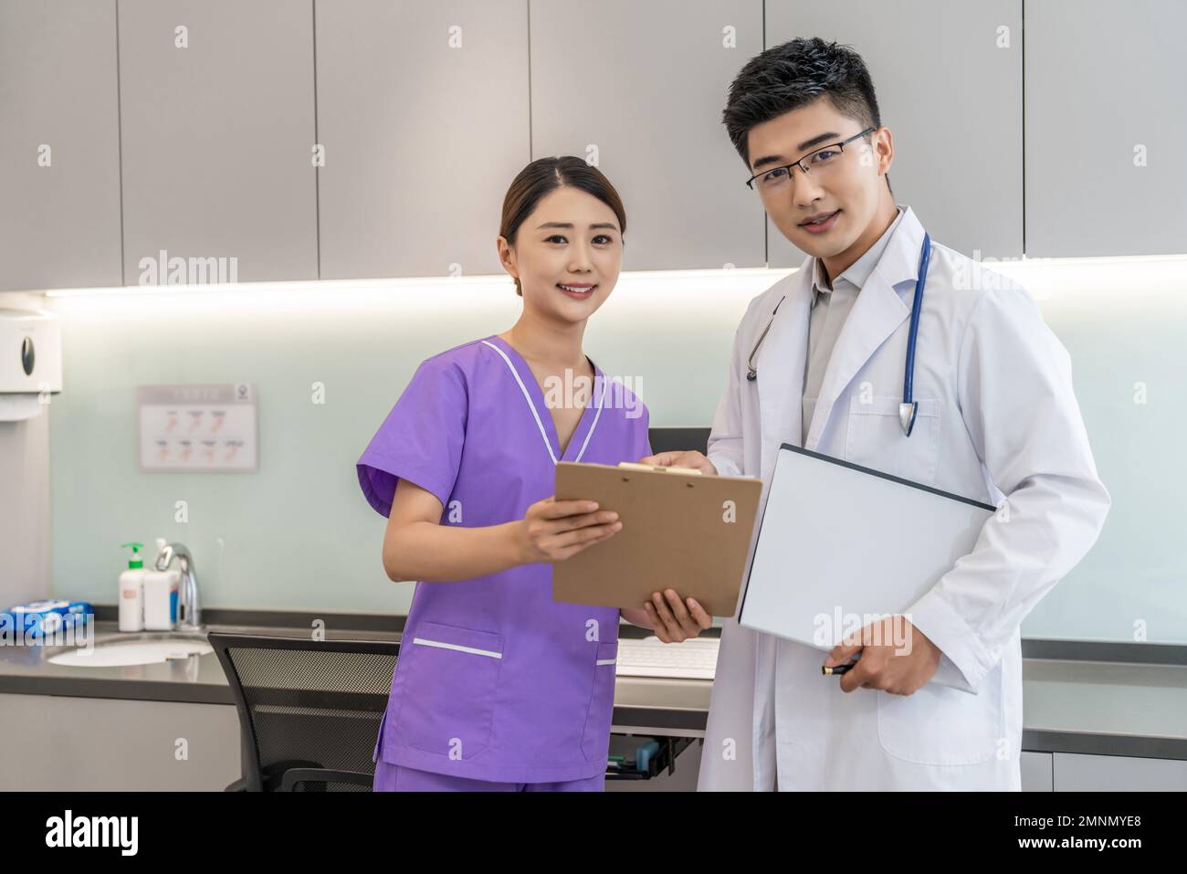 Two doctors at the clinic work Stock Photo - Alamy