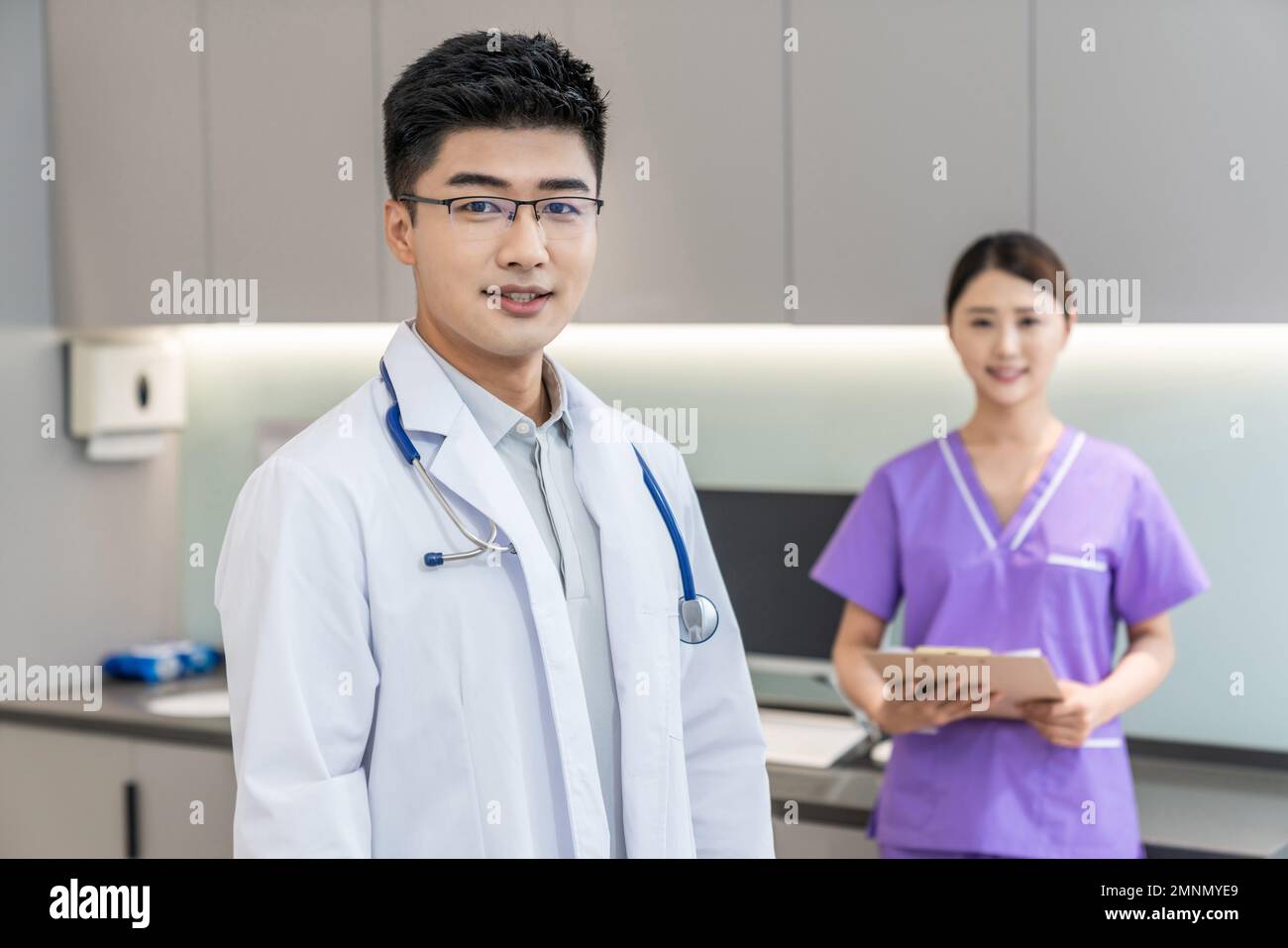 Two doctors at the clinic work Stock Photo - Alamy