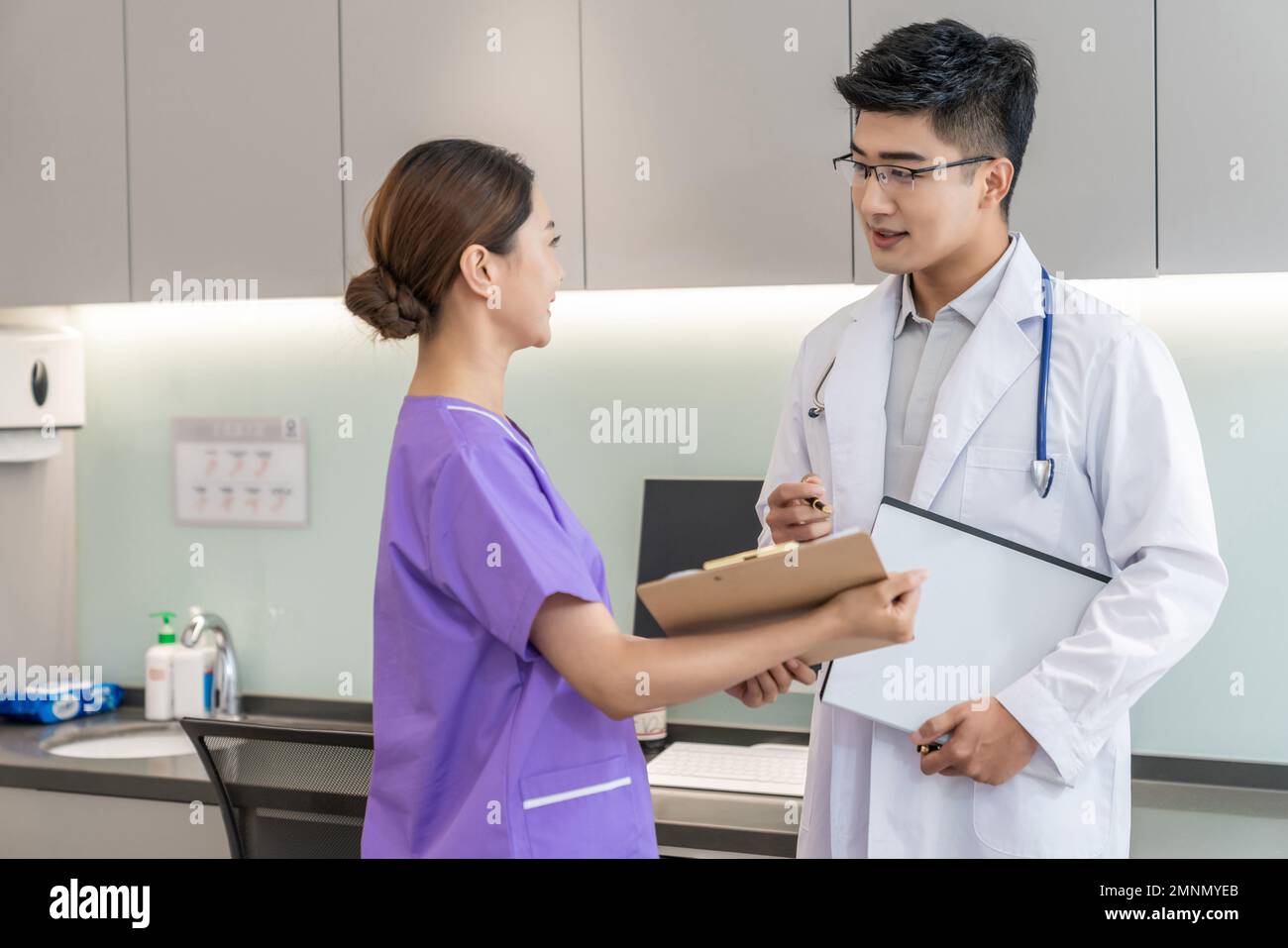 Two doctors at the clinic work Stock Photo - Alamy