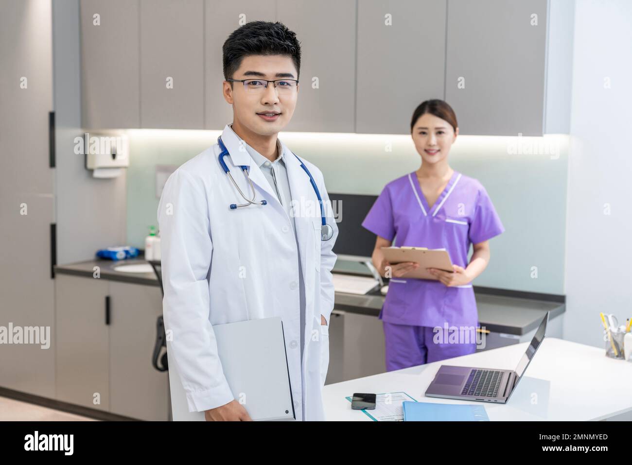 Two doctors at the clinic work Stock Photo - Alamy