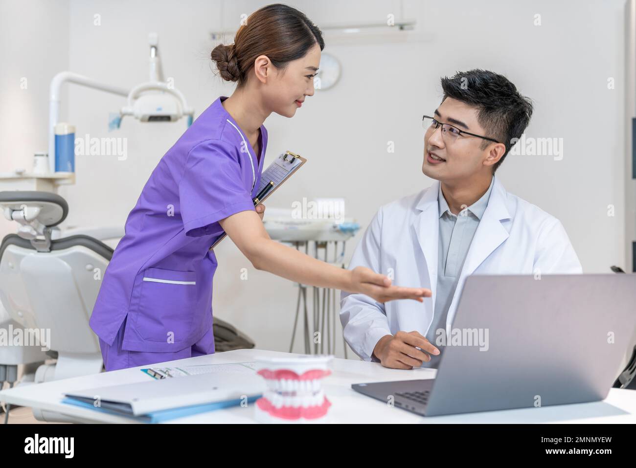 Two doctors at the clinic work Stock Photo - Alamy