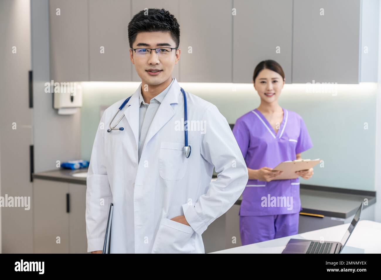 Two doctors at the clinic work Stock Photo - Alamy