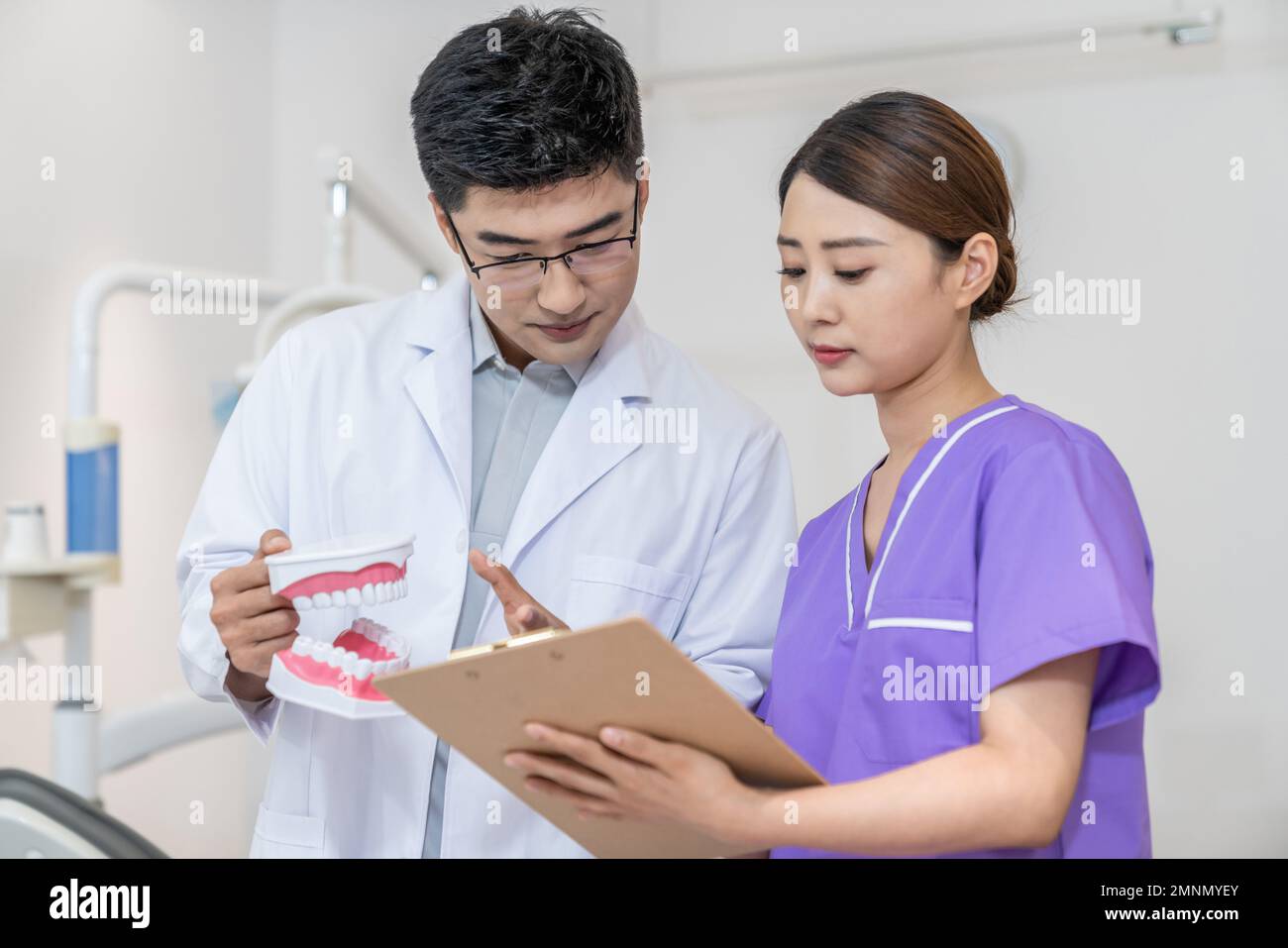 Two doctors at the clinic work Stock Photo - Alamy
