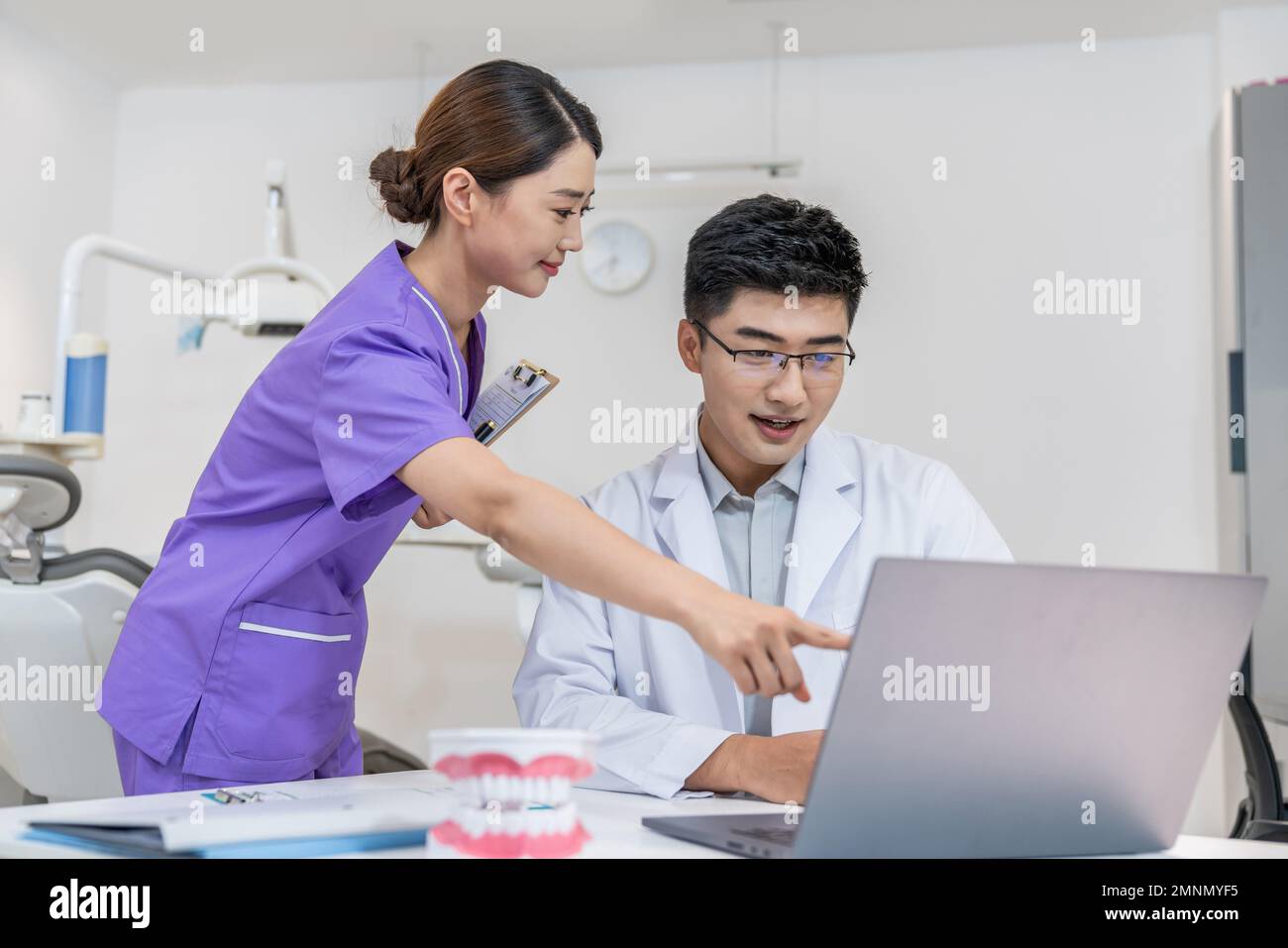 Two doctors at the clinic work Stock Photo - Alamy