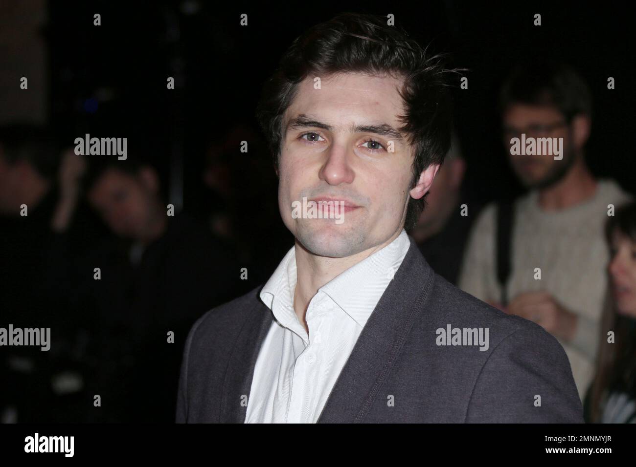 Phil Dunster poses for photographers upon arrival at the Empire Film ...