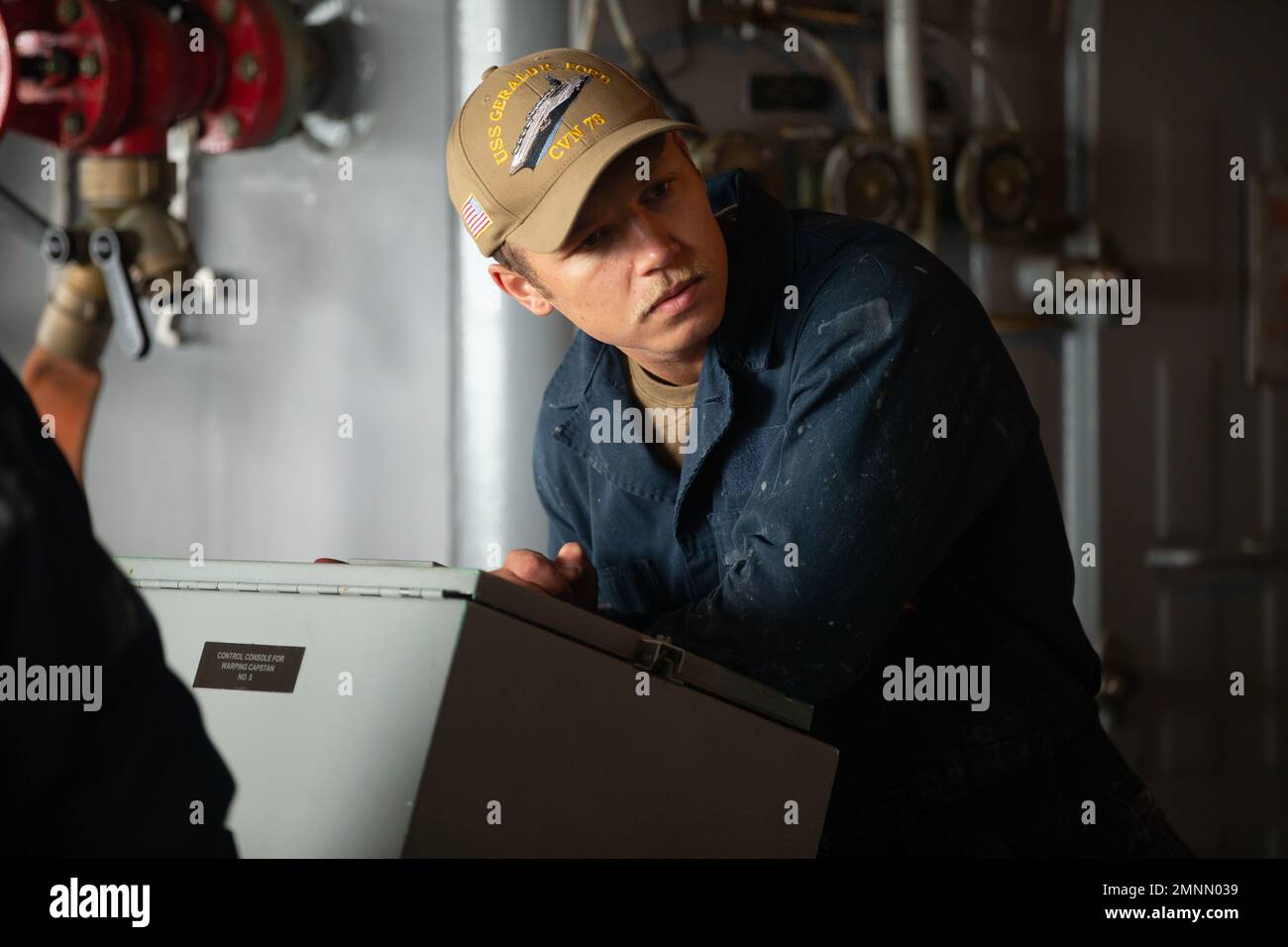 Boatswain's Mate Seaman Tarin Adams, from Newberg, Oregon, assigned to ...