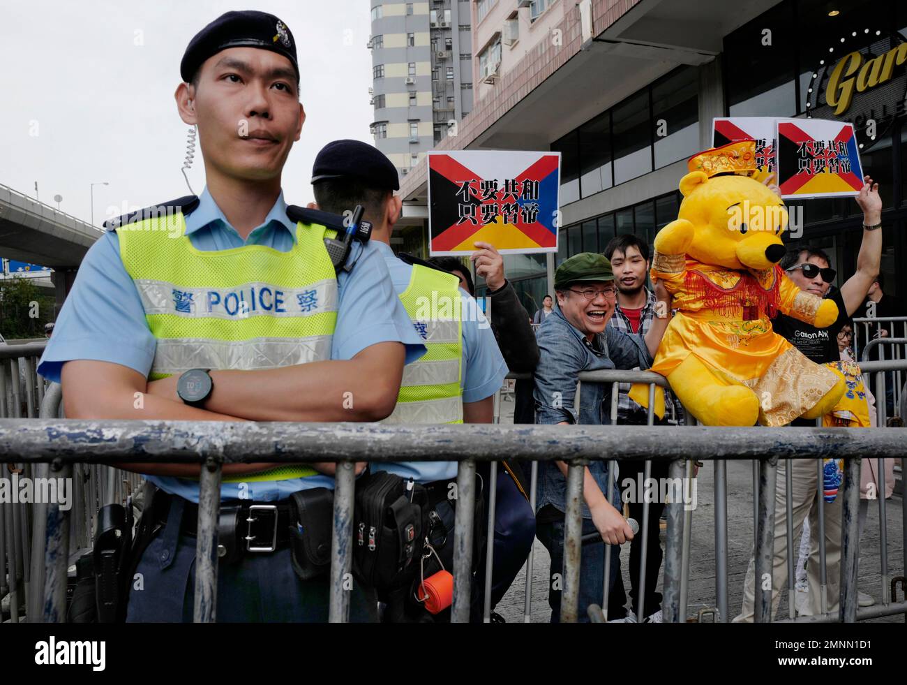 Protesters raise a Winnie the Pooh dressing as emperor to symbolize ...
