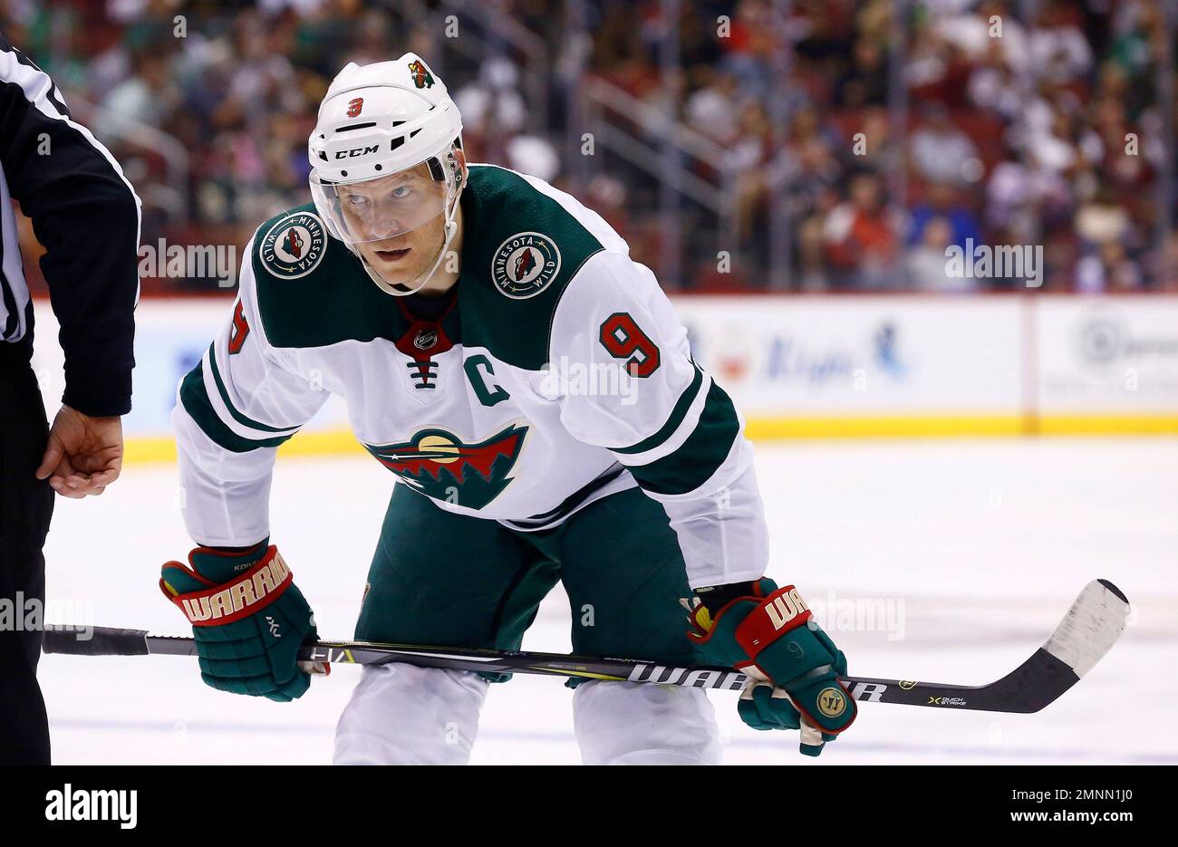 Minnesota Wild center Mikko Koivu (9) pauses on the ice during the ...