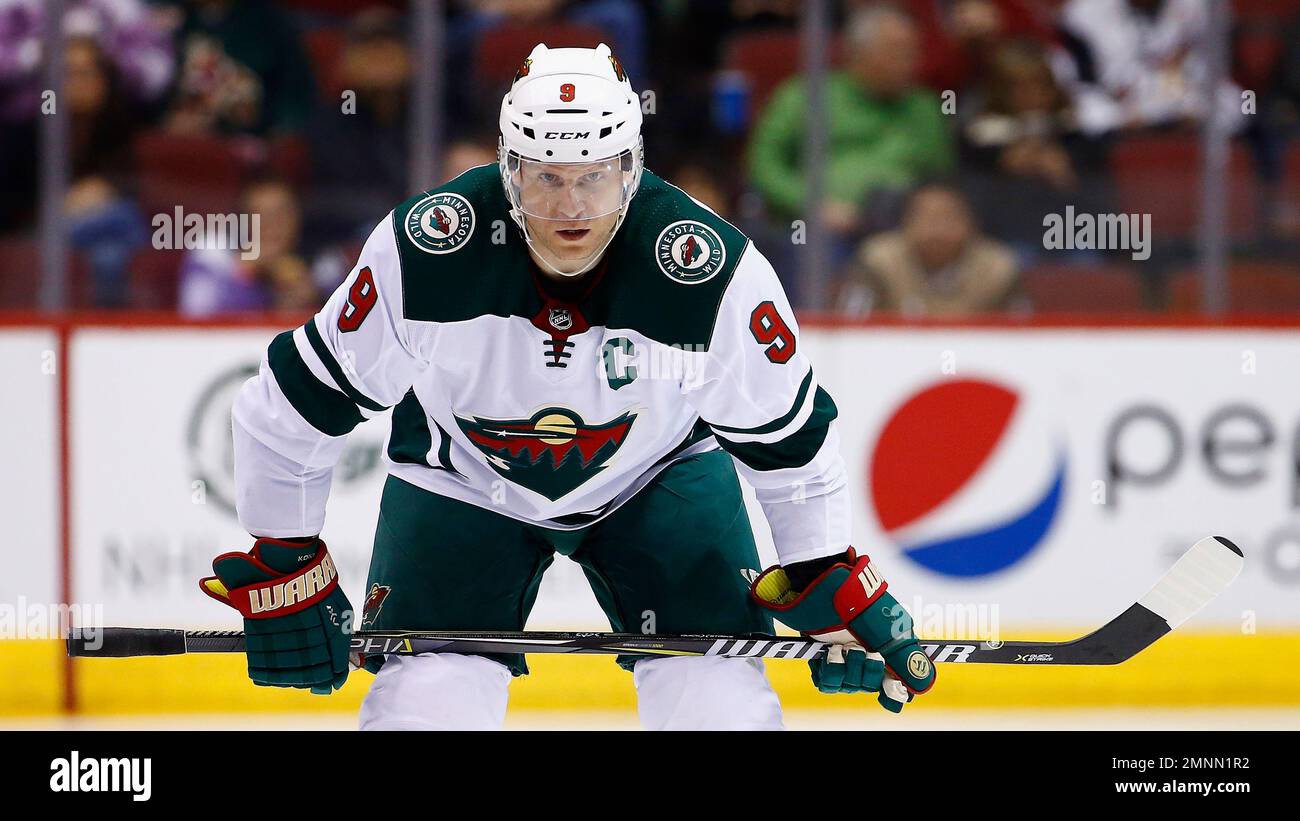Minnesota Wild center Mikko Koivu pauses on the ice during the third ...