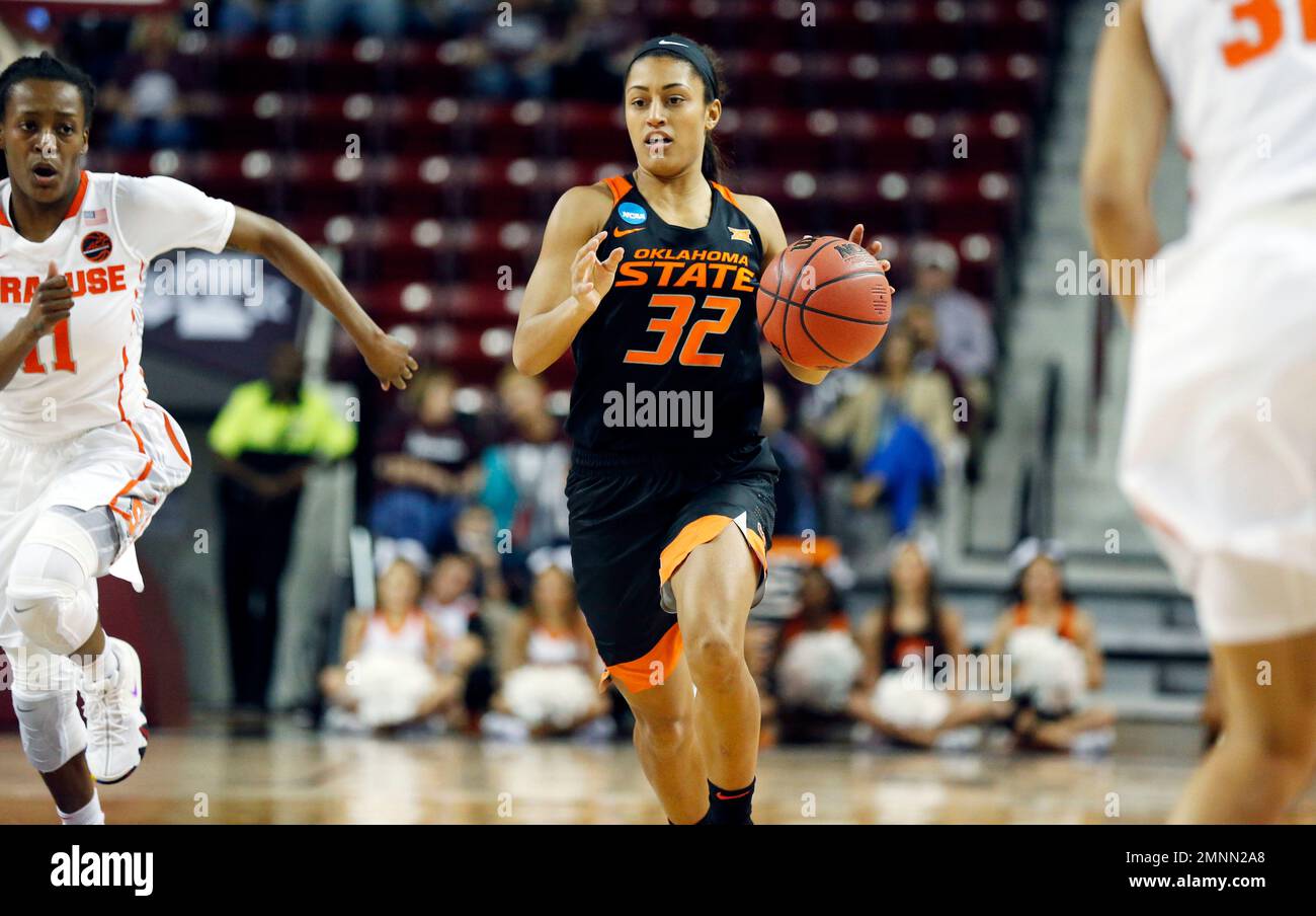 Oklahoma State guard Loryn Goodwin (32) dribbles up court during a ...