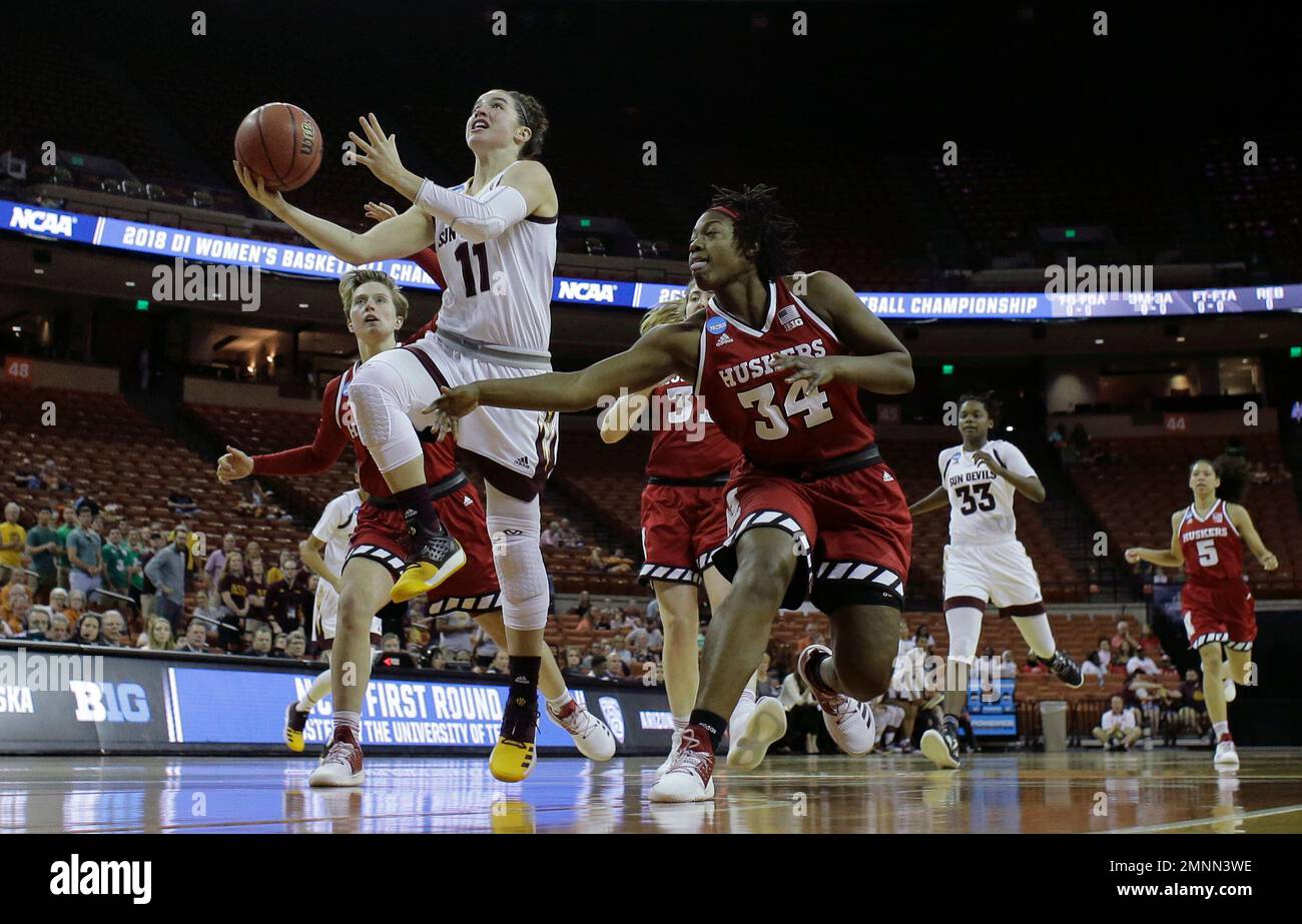 Arizona State guard Robbi Ryan (11) drives to the basket past Nebraska ...