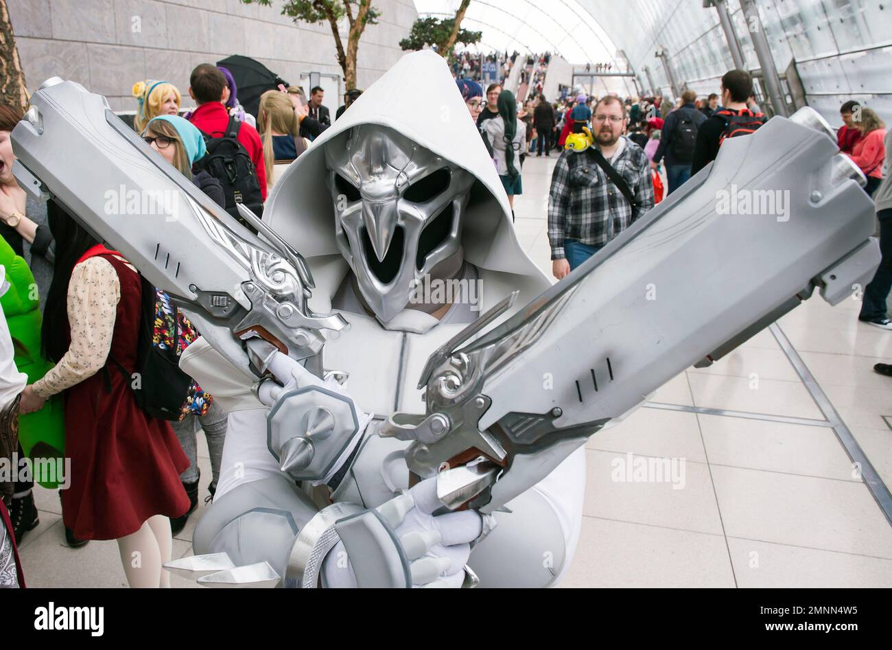A cosplayer dressed in a fantasy costume performs during the Manga ...
