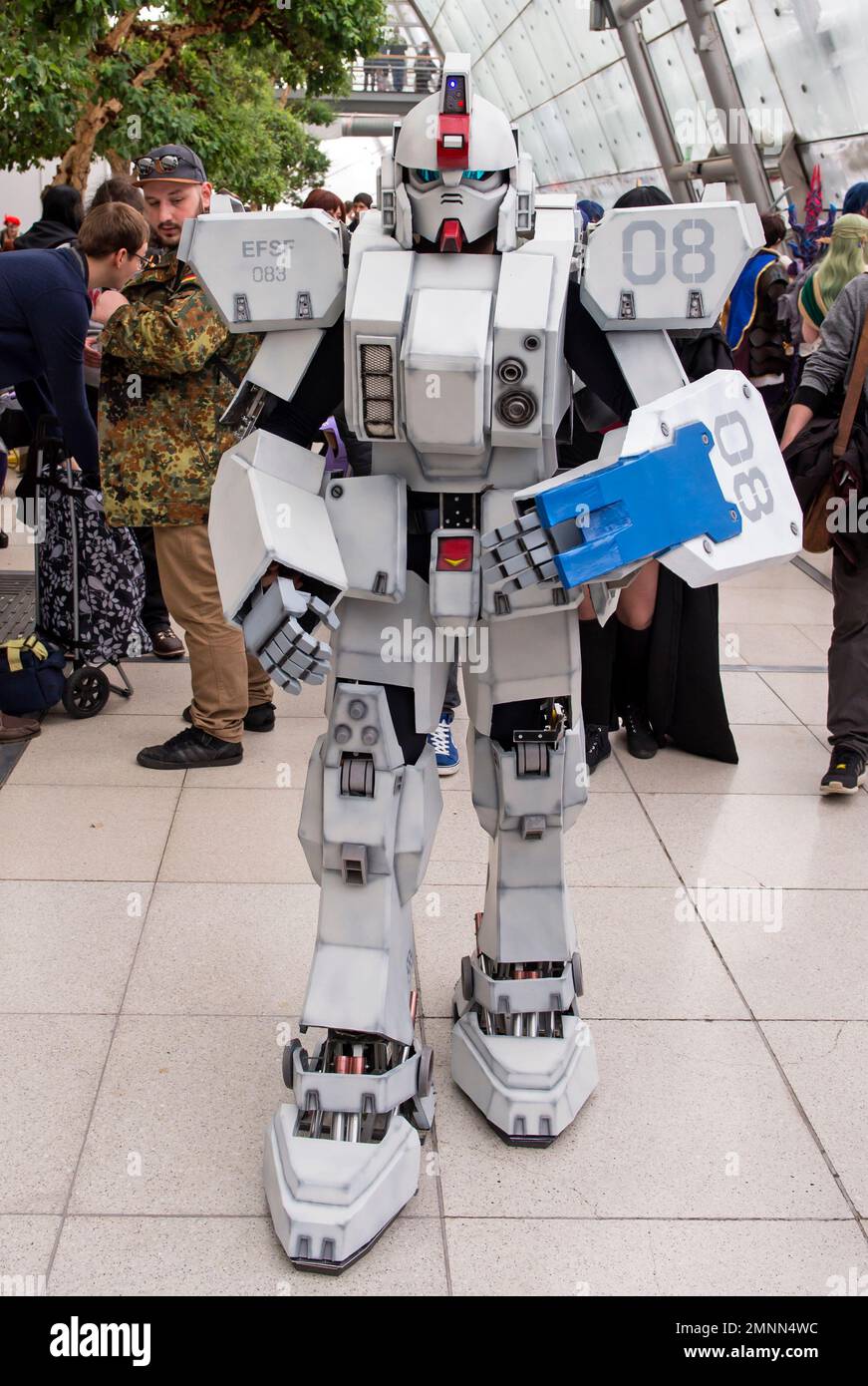 A cosplayer dressed in a fantasy costume performs during the Manga ...