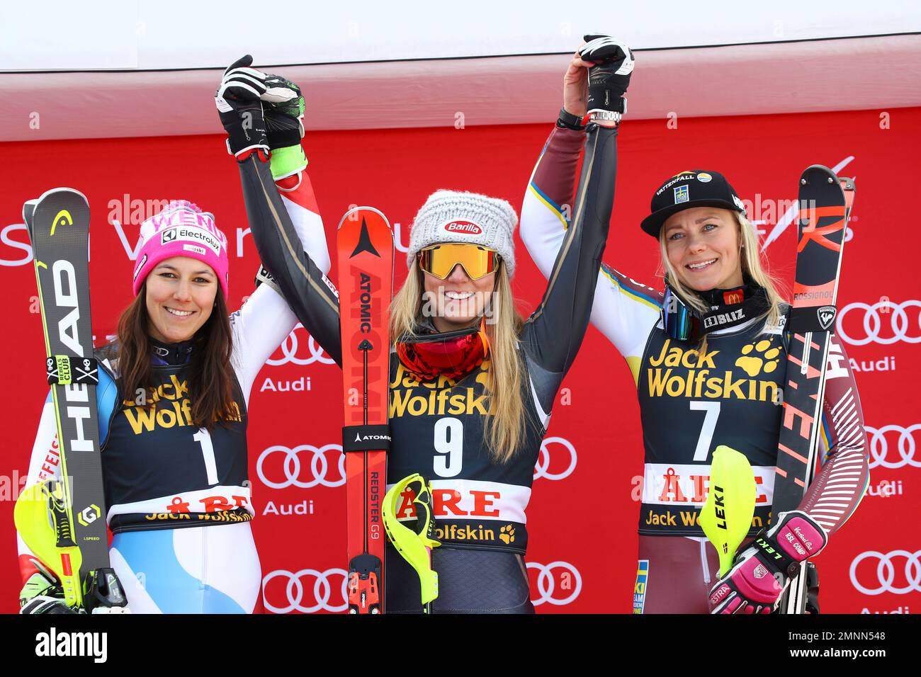 United States's Mikaela Shiffrin, center, the winner, is flanked by ...
