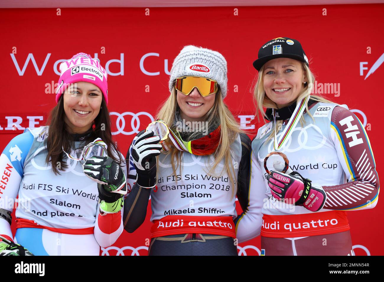 United States's Mikaela Shiffrin, center, the winner, is flanked by ...