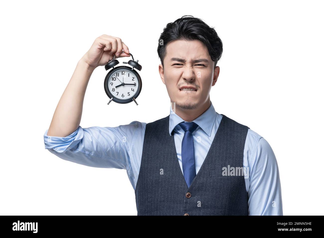 Business man with an alarm clock Stock Photo - Alamy