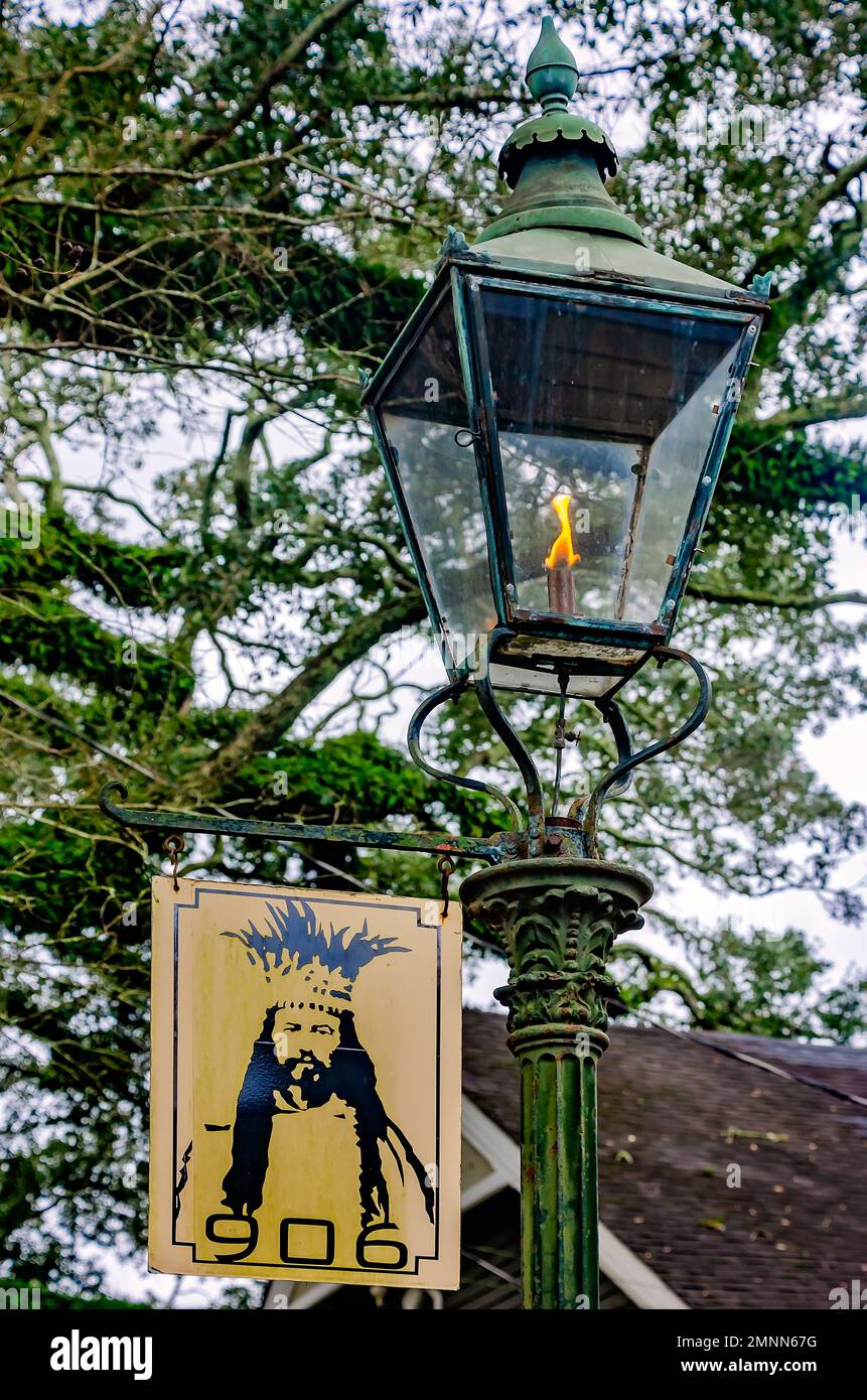 A picture of Joe Cain hangs outside his home on Augusta Street in the ...