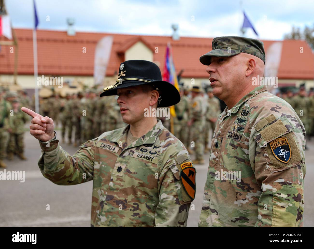 U.S. Army Lt. Col. Sean M. Castilla, left, incoming commander of ...