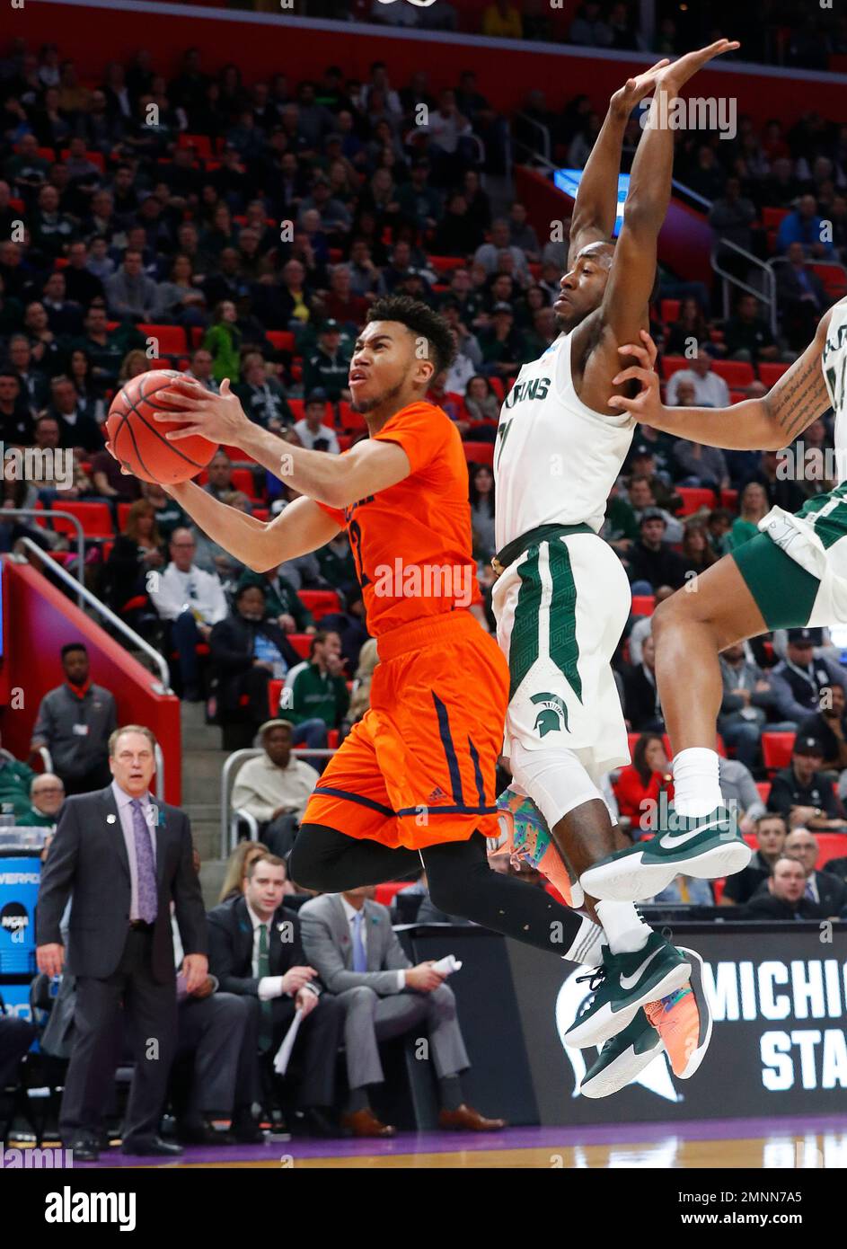Bucknell guard Stephen Brown, left, drives on Michigan State guard ...