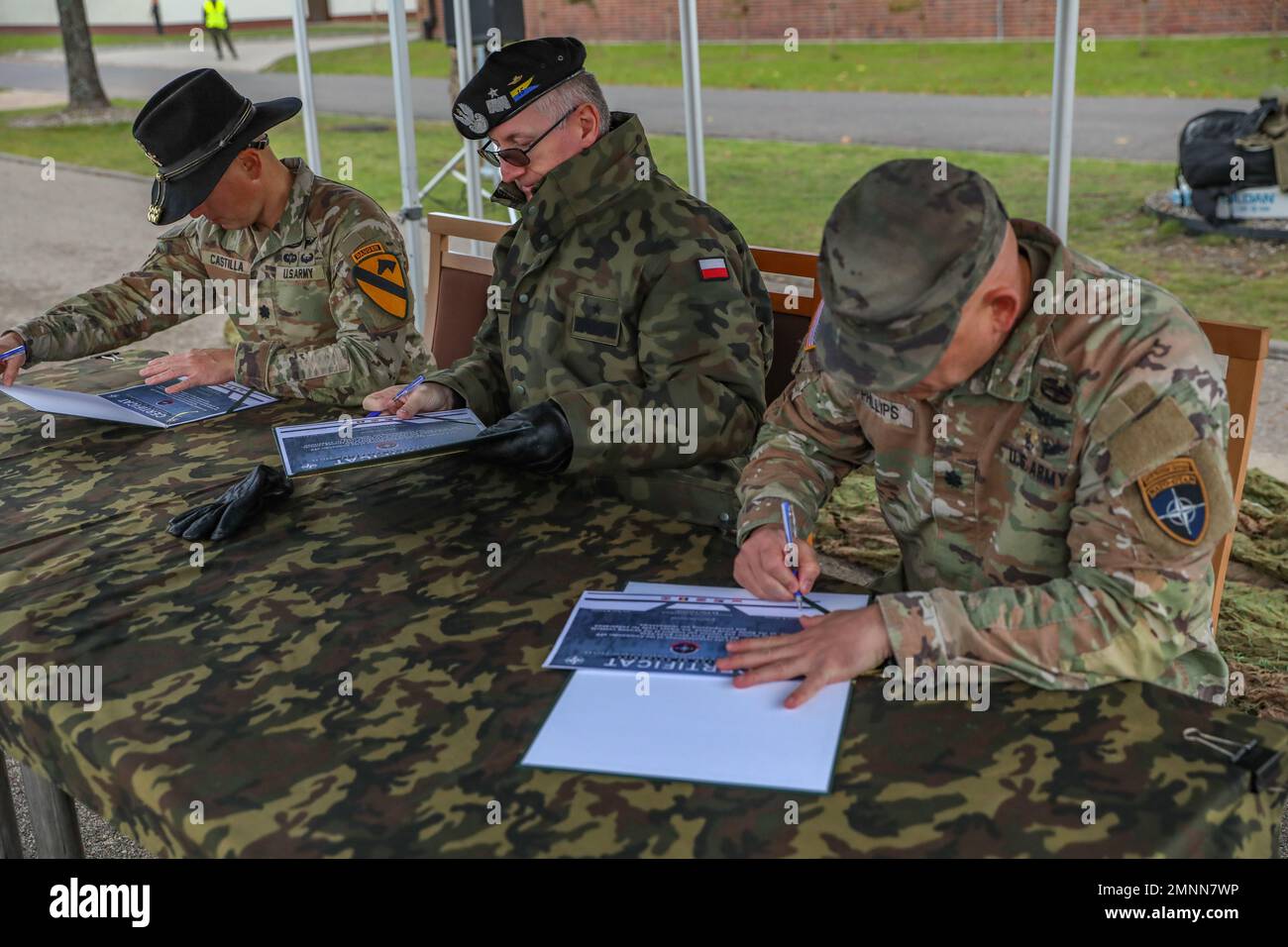 From left, U.S. Army Lt. Col. Sean M. Castilla, incoming commander of ...