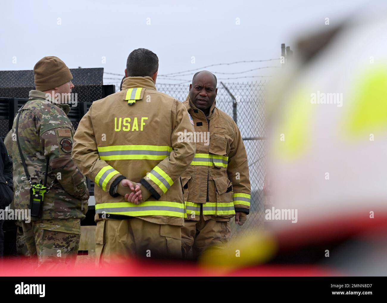 Col. Todd Randolph, 316th Wing and installation commander, speaks with ...