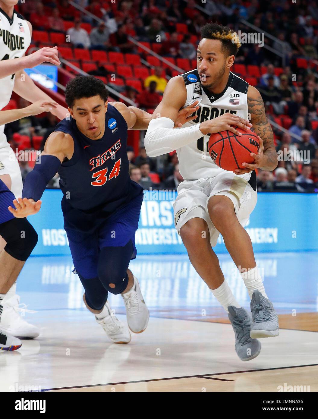 Purdue forward Vincent Edwards (12) drives on Cal State Fullerton ...