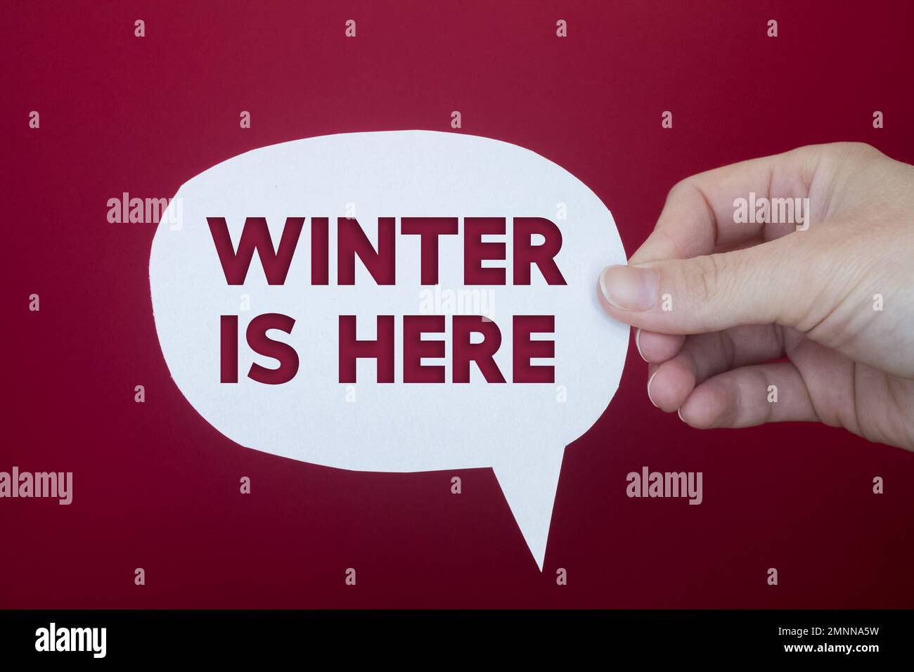 Speech bubble in front of colored background with Winter is Here text ...
