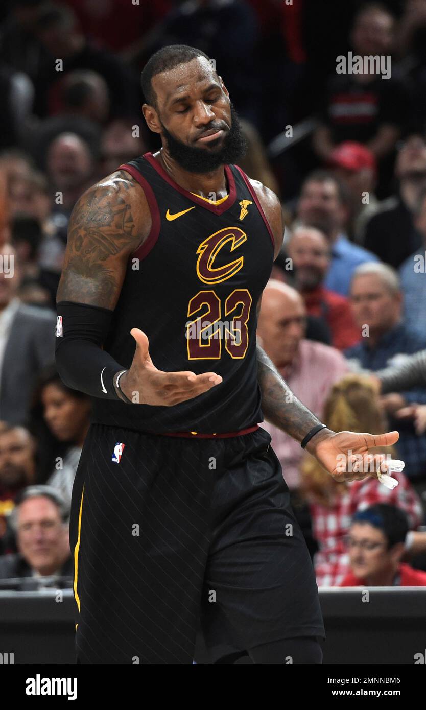 Cleveland Cavaliers forward LeBron James shrugs after missing a shot ...