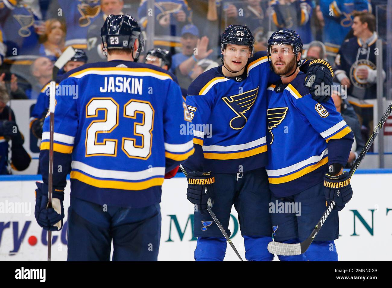 St. Louis Blues' Joel Edmundson, right, is congratulated by teammates ...